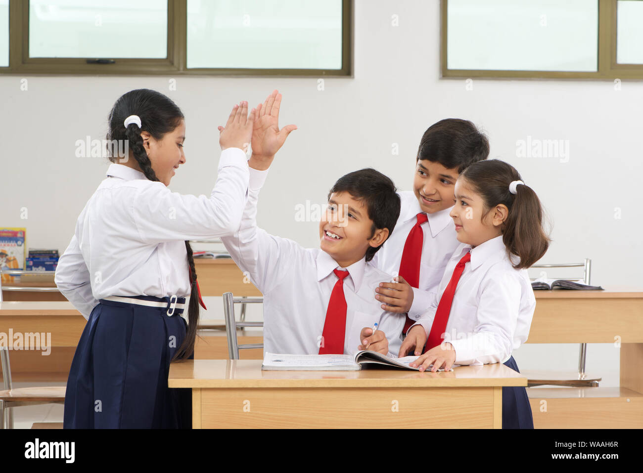 School children studying in a classroom Stock Photo - Alamy