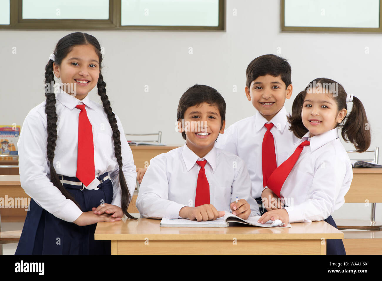 School children studying in a classroom Stock Photo - Alamy