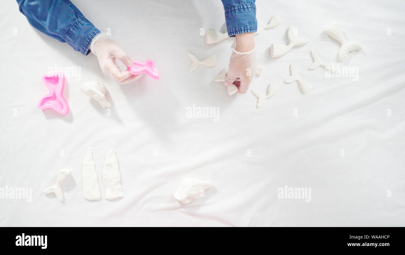 Flat lay. Step by step. Making mermaid tail from modeling clay in ...
