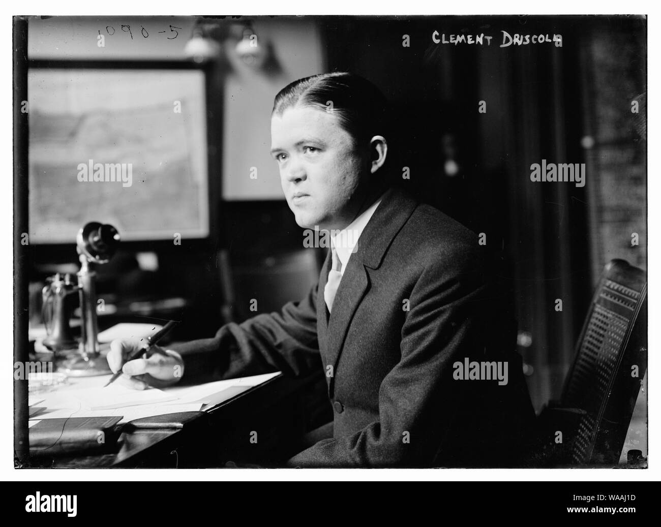 Man seated desk focused on Black and White Stock Photos & Images - Alamy