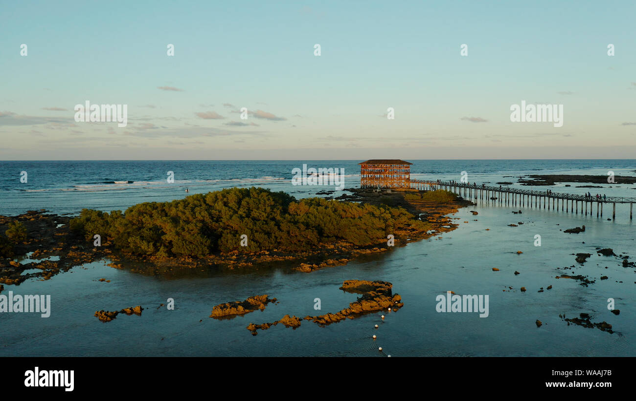 Viewpoint in the ocean at Cloud Nine surf point, Siargao island ...