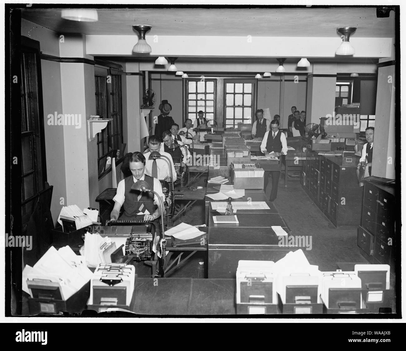 Clerks tabulating hi-res stock photography and images - Alamy