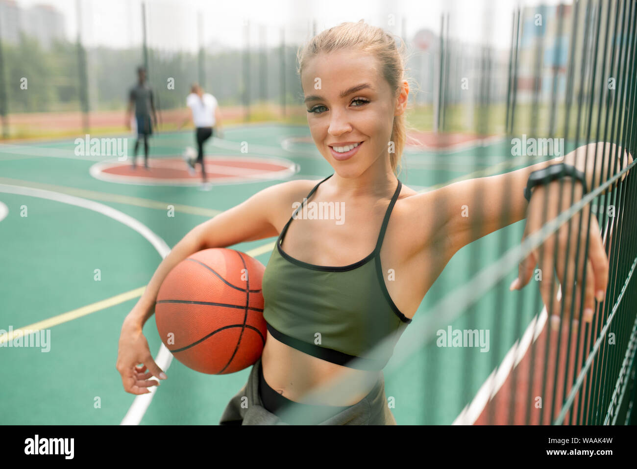High school student playing basketball hi-res stock photography and ...