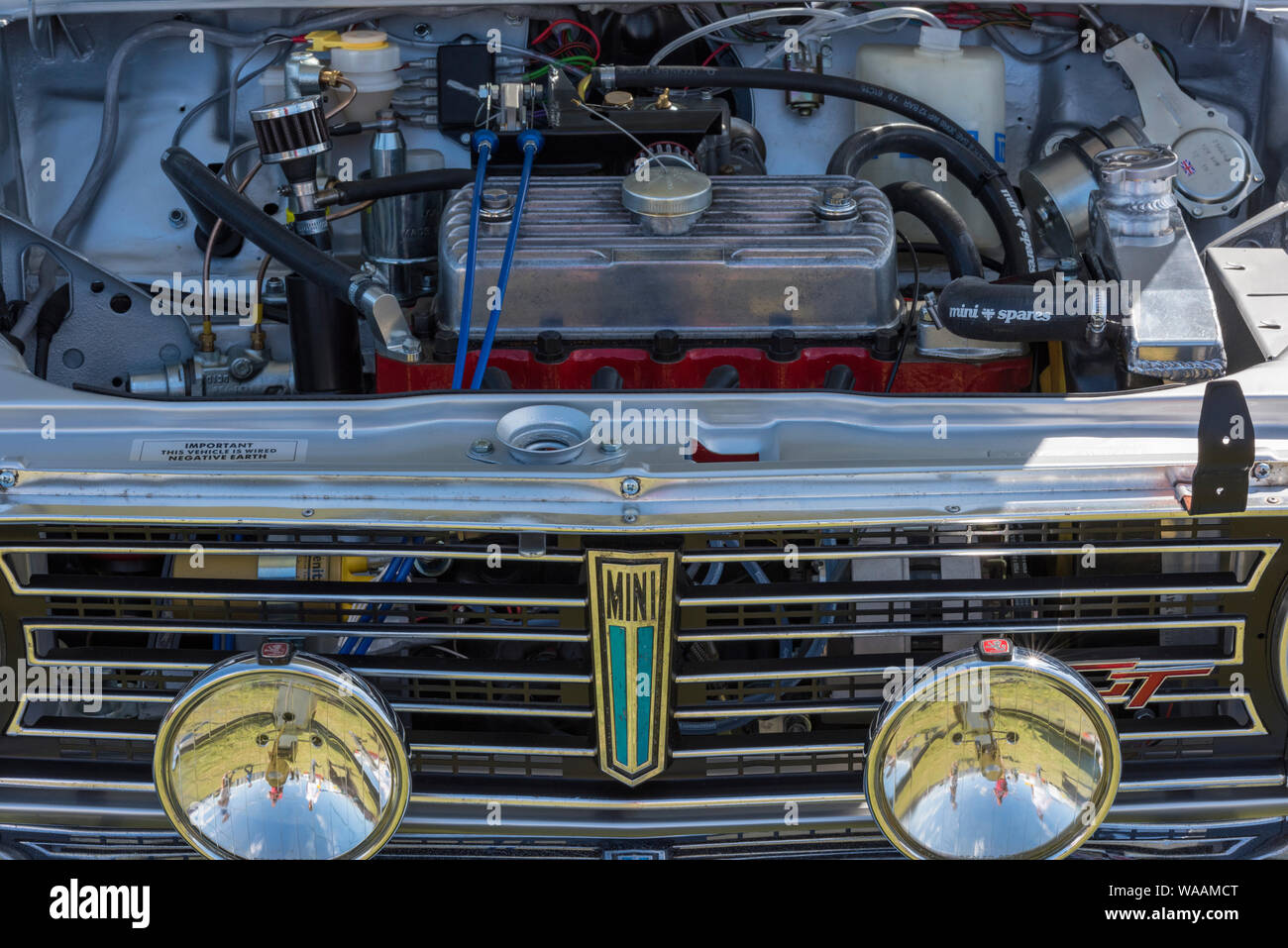 a restored mini engine on a classic motor car at a car show of motors ...