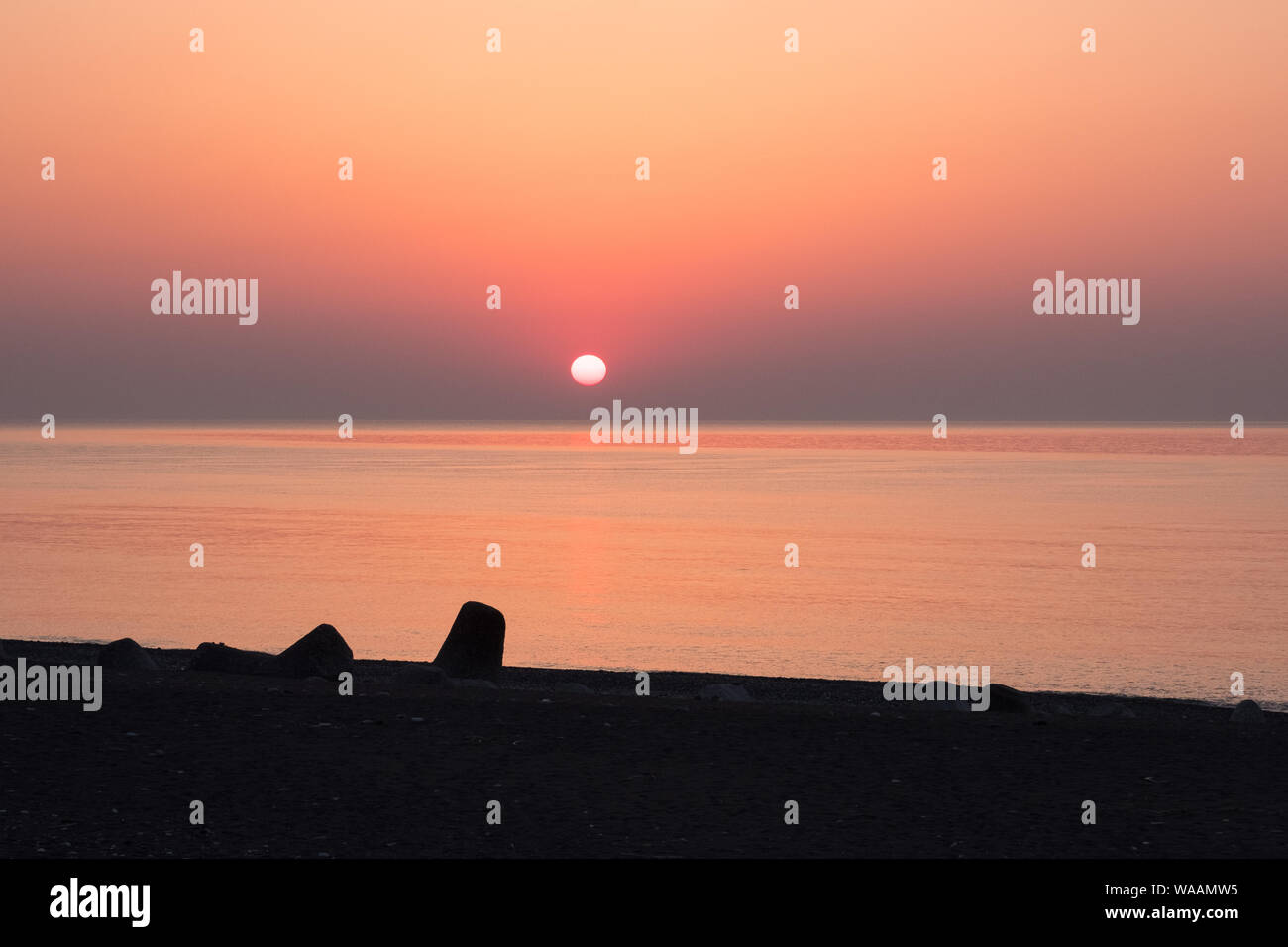 Sunset on the beach in Japan Stock Photo - Alamy