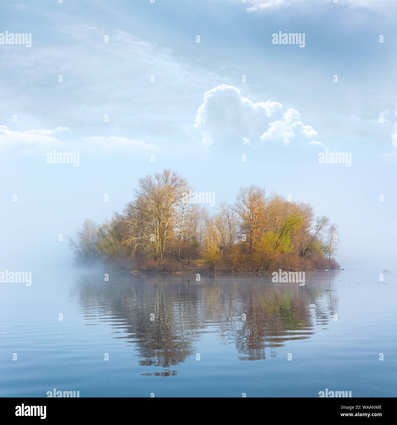 Autumn island in the fog Stock Photo - Alamy