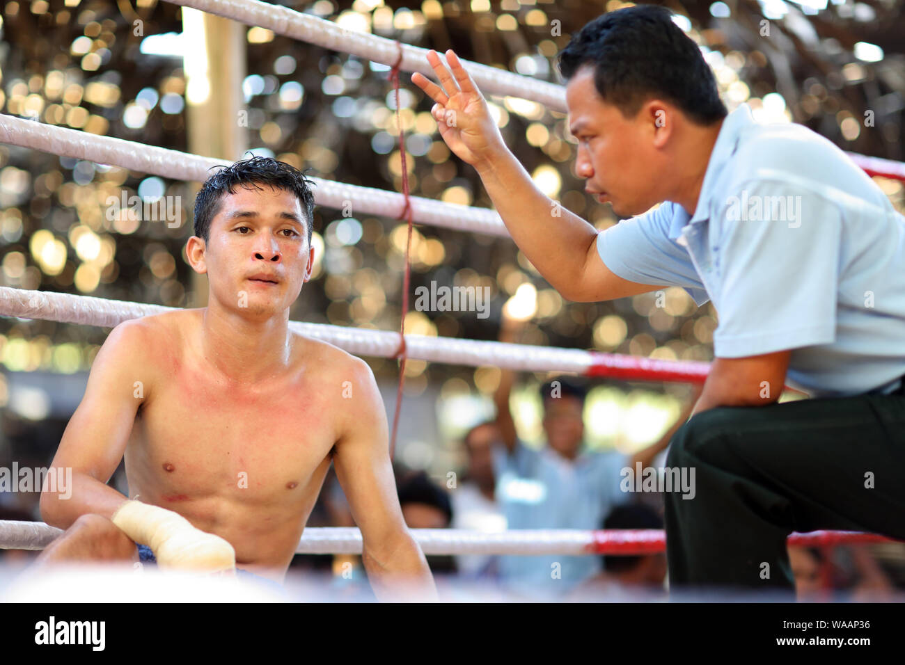 Traditional Lethwei boxer at a rural tournament in a village near Hpa ...