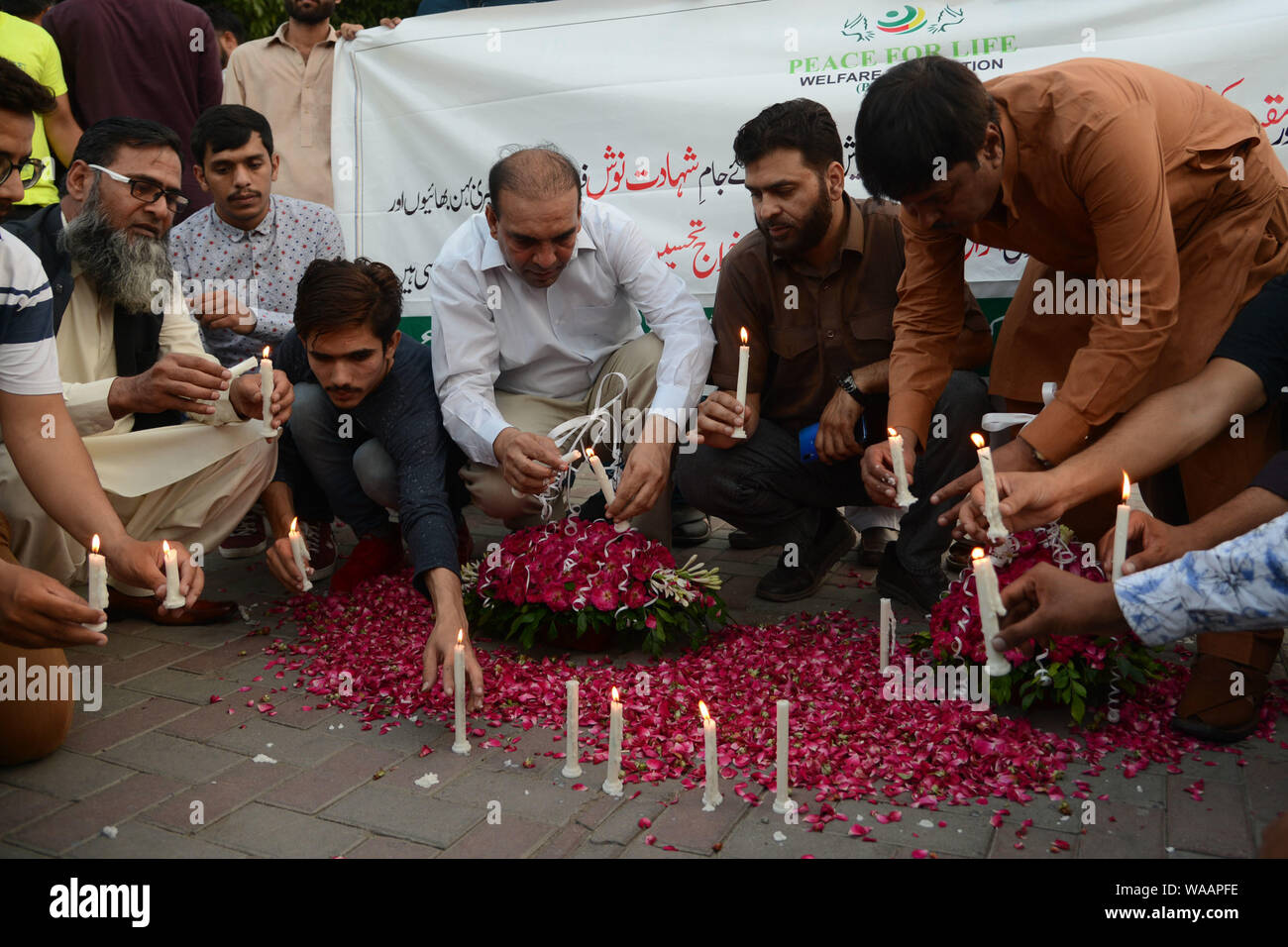 Lahore, Pakistan. 18th Aug, 2019. Pakistani members of Peace for Life ...