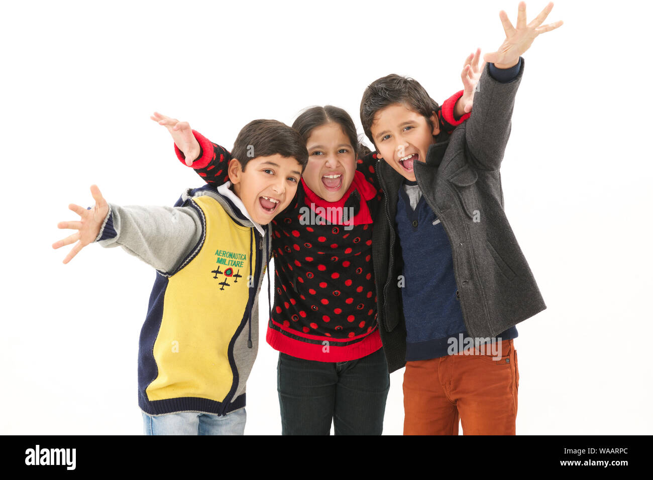 Three friends standing together and enjoying Stock Photo - Alamy