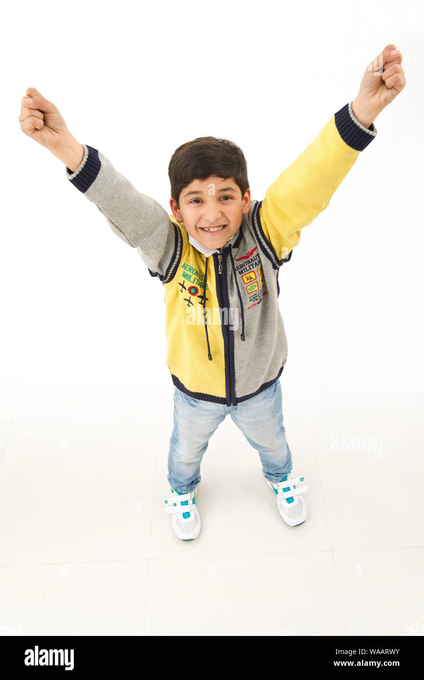 Boy looking view hand raised hi-res stock photography and images - Alamy