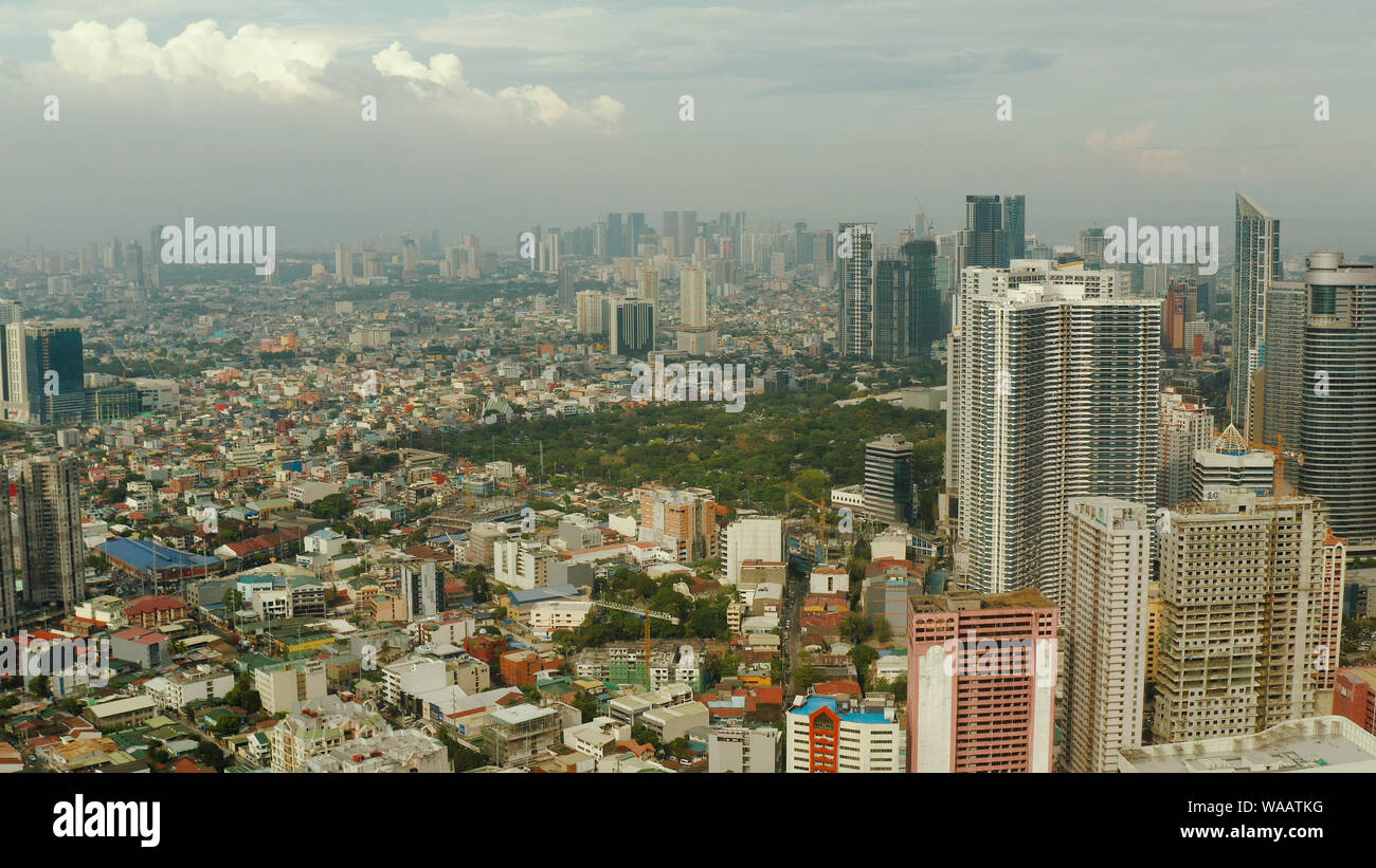 Aerial view of Panorama of Manila with skyscrapers and business centers ...