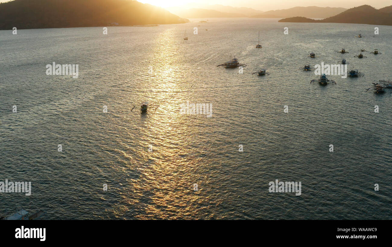 aerial view Sea bay with boats at sunset. Sunset over the sea with ...