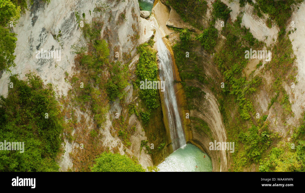 Beautiful waterfall in green forest, top view. Tropical Dao Falls in ...