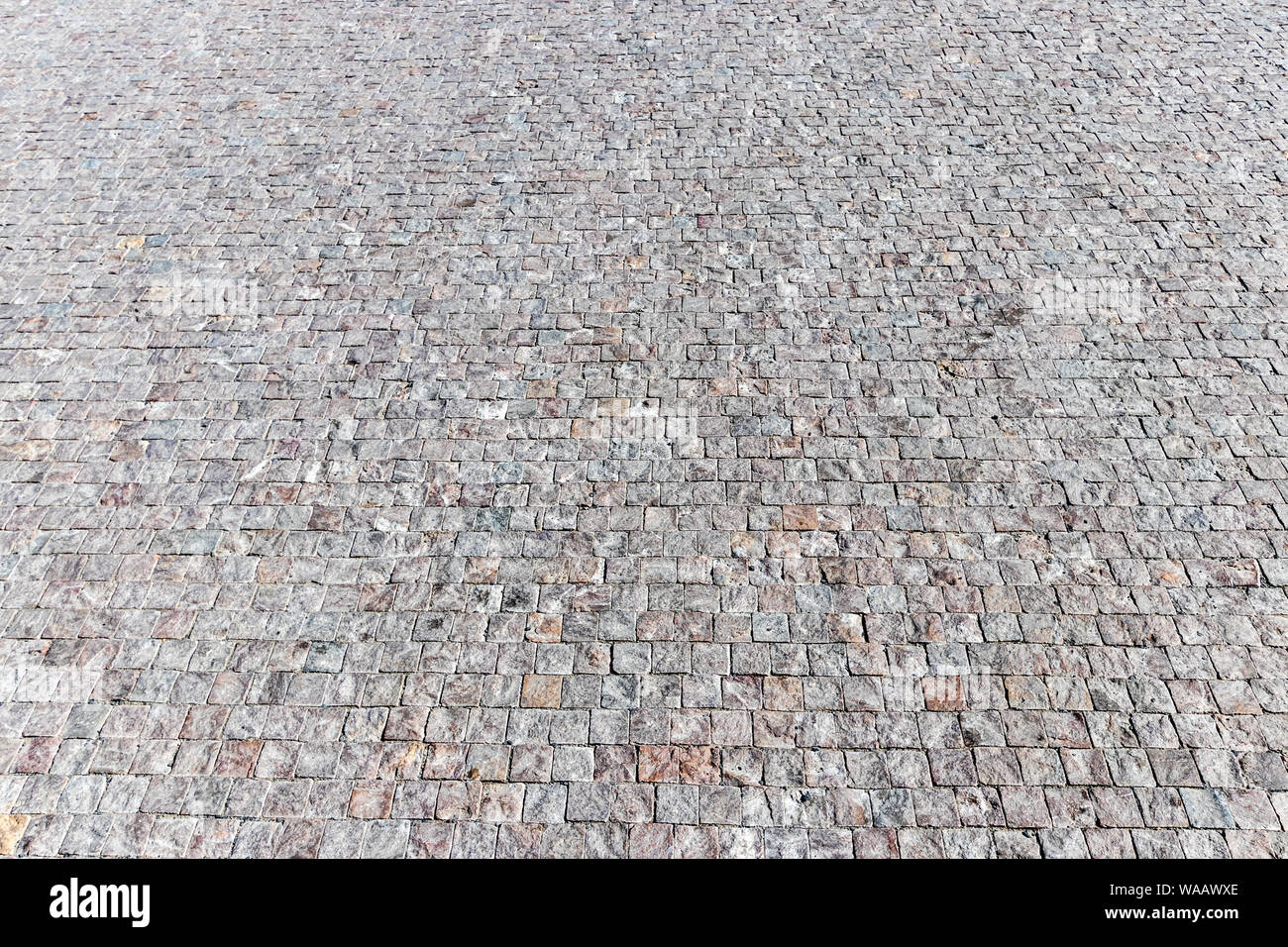 Top view on paving stone road. Old pavement of granite texture. Street ...