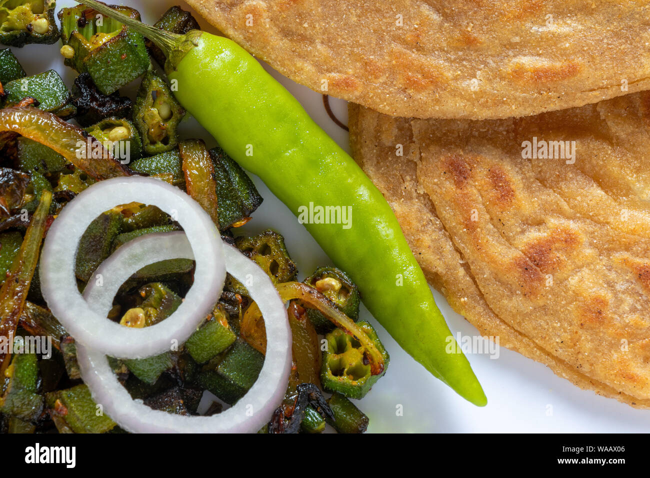 Lachha Paratha, whole wheat layered flat bread with Masala Bhindi (Lady ...