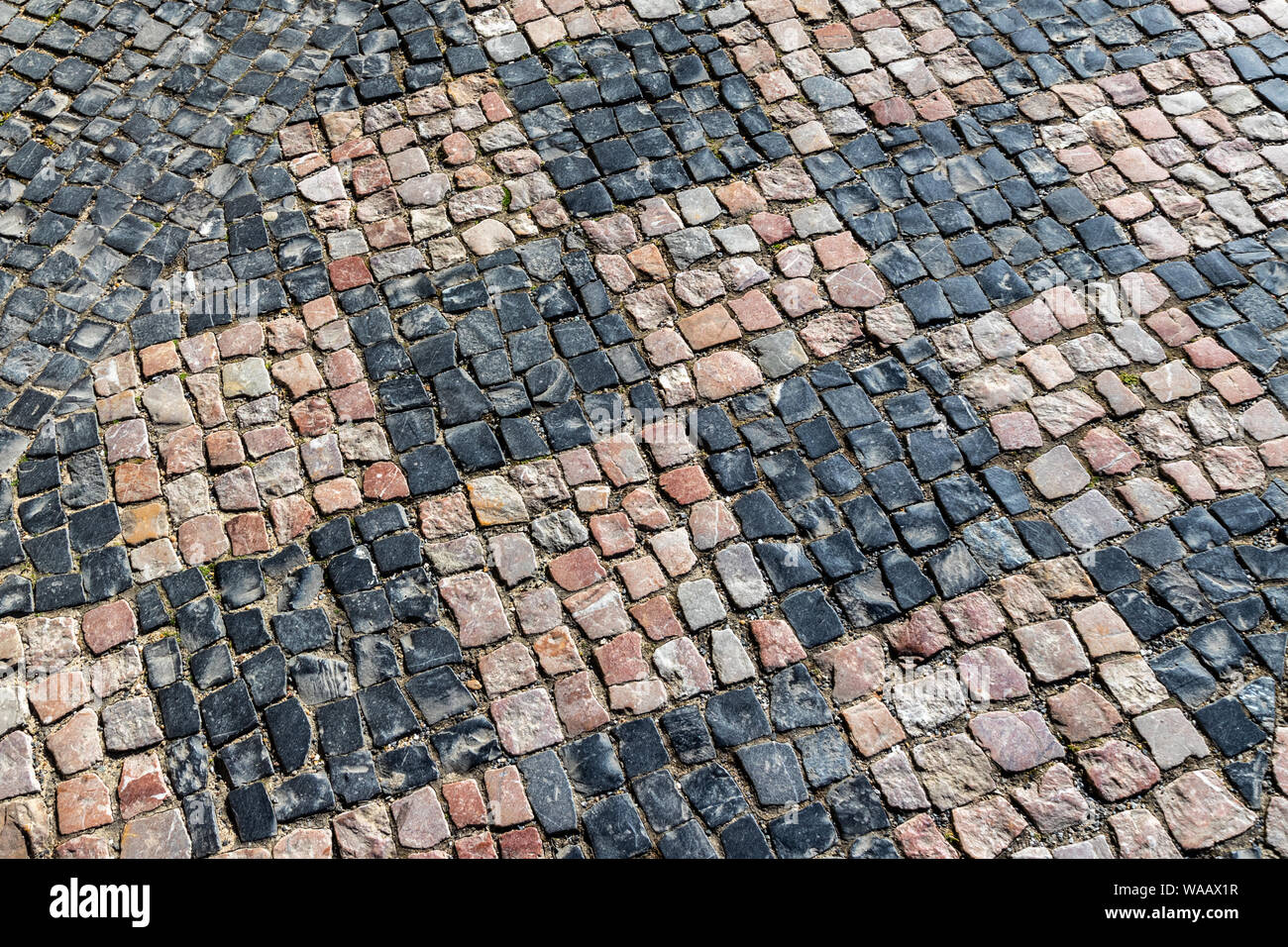 Top view on paving stone road. Old pavement of granite texture. Street ...