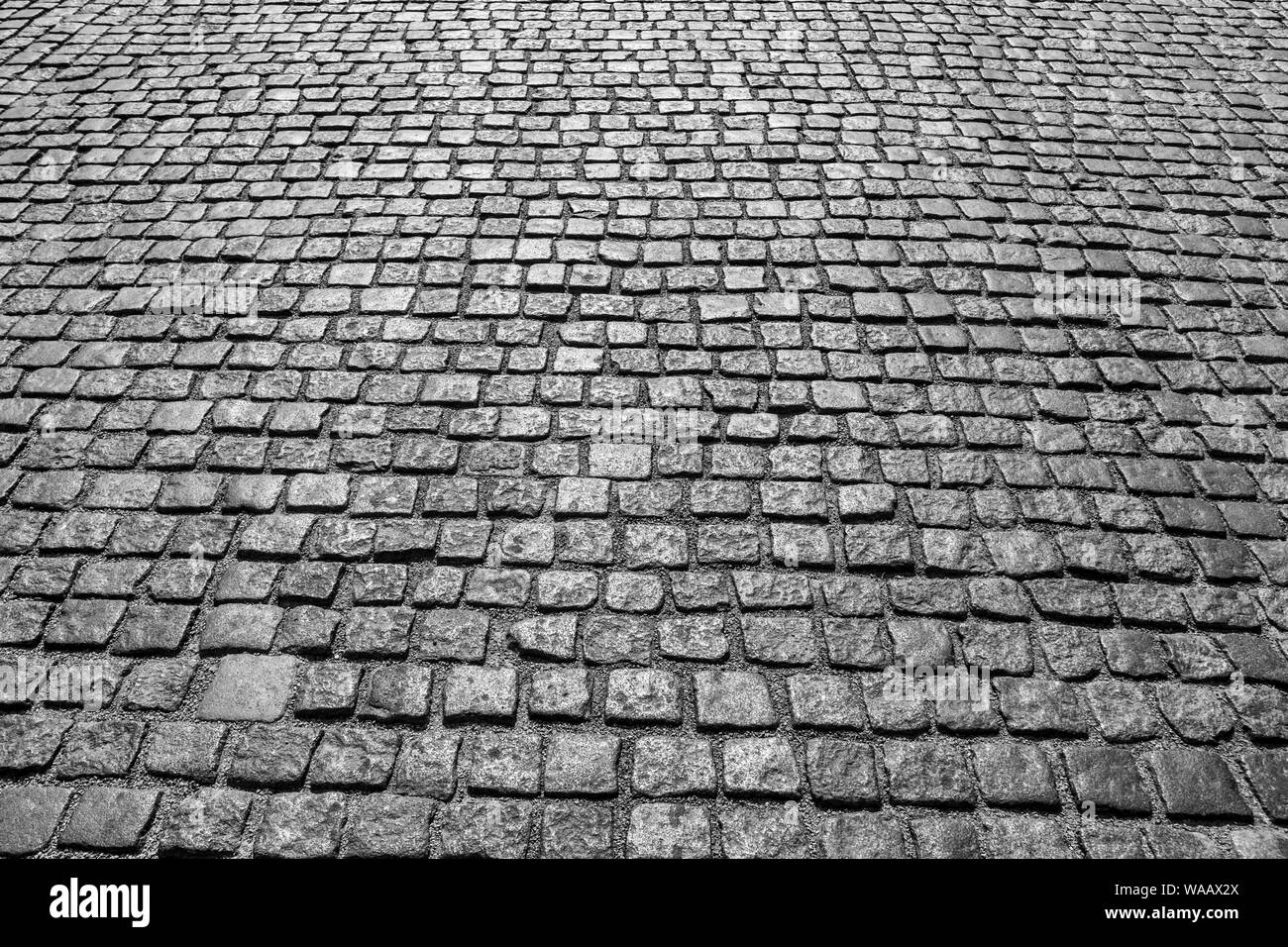 Top view on paving stone road. Old pavement of granite texture. Street ...