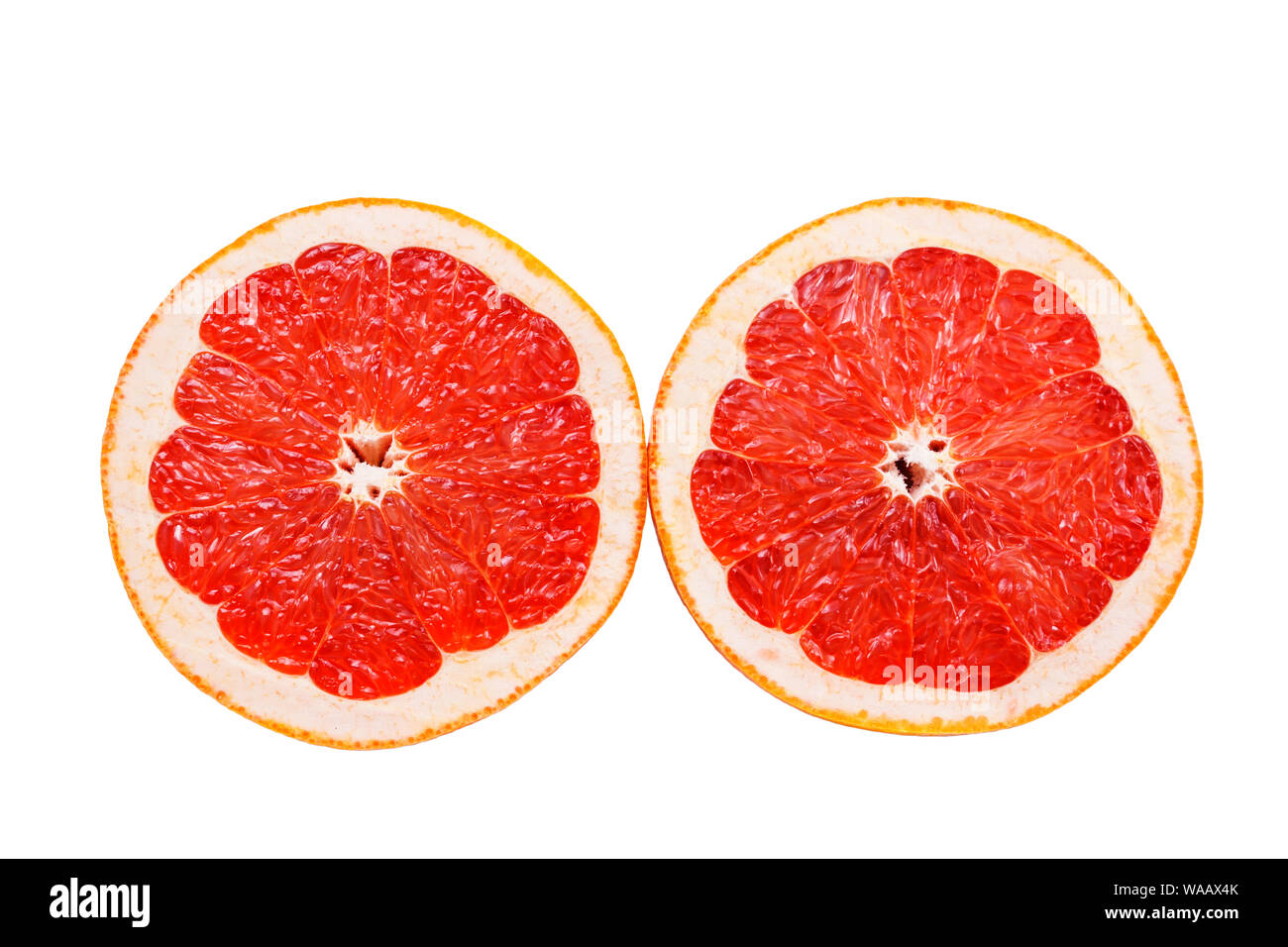 two halves of pink grapefruit isolated on white background Stock Photo ...
