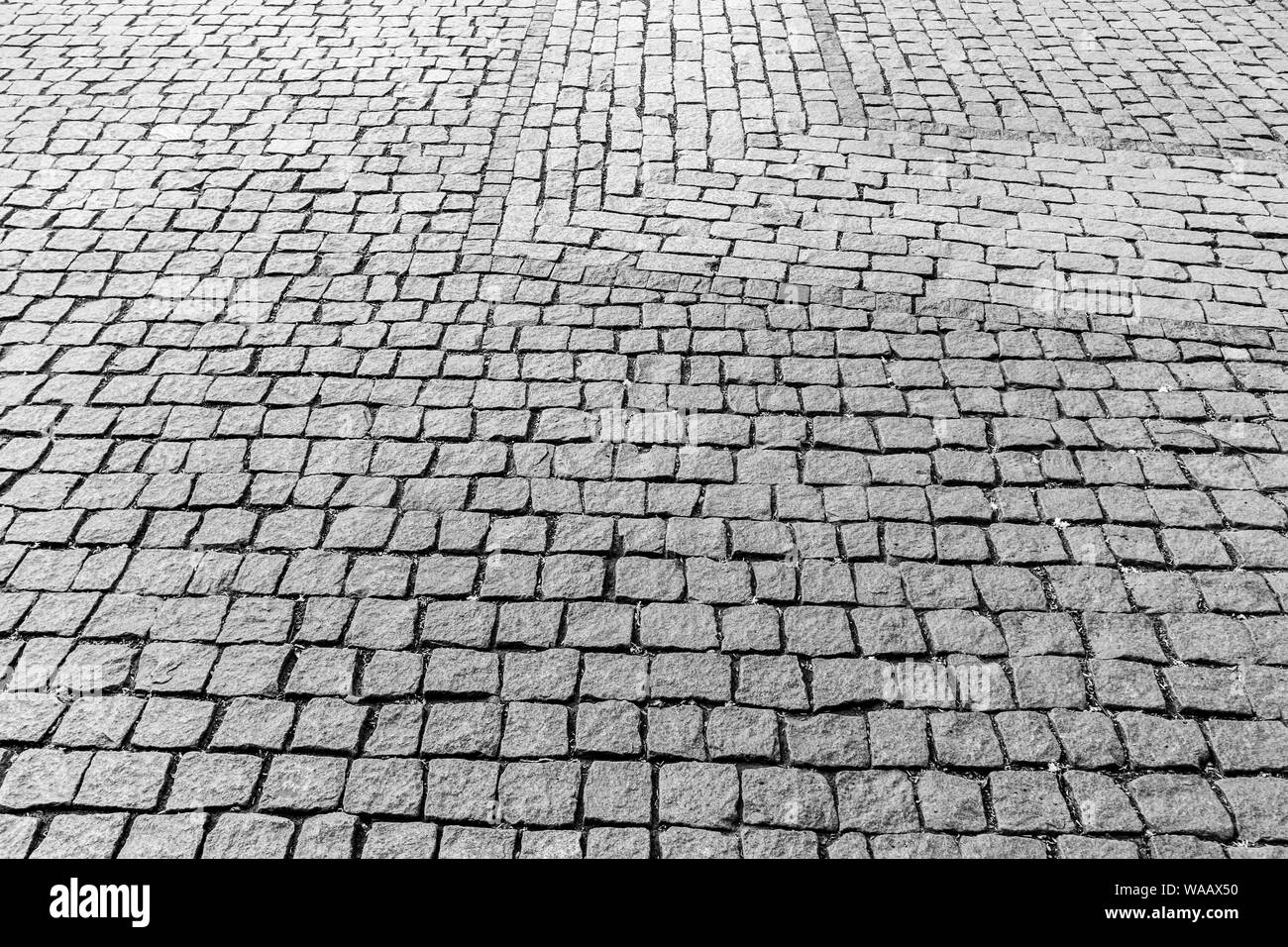 Top view on paving stone road. Old pavement of granite texture. Street ...