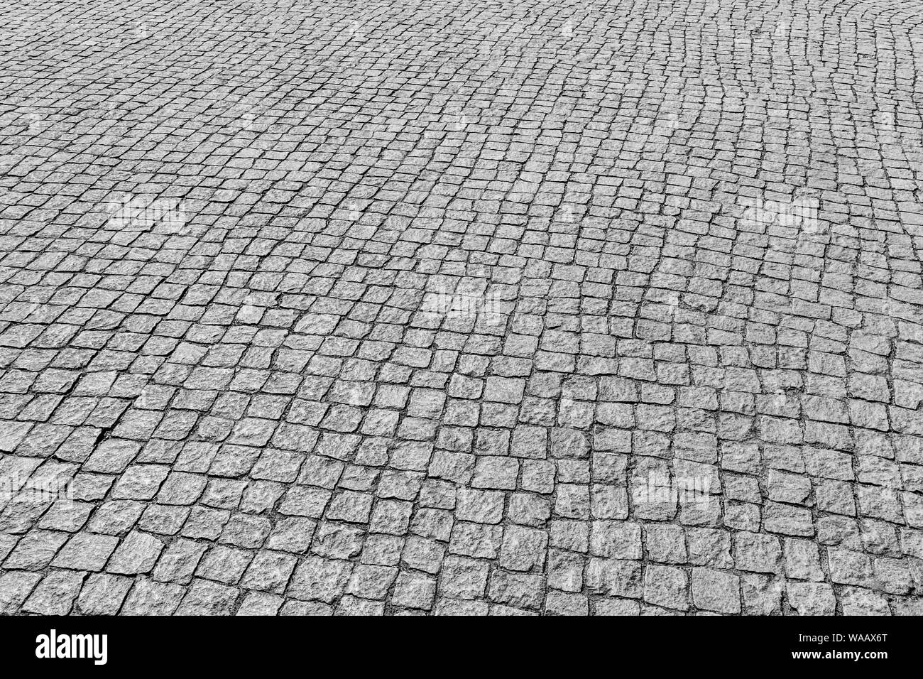 Top view on paving stone road. Old pavement of granite texture. Street ...