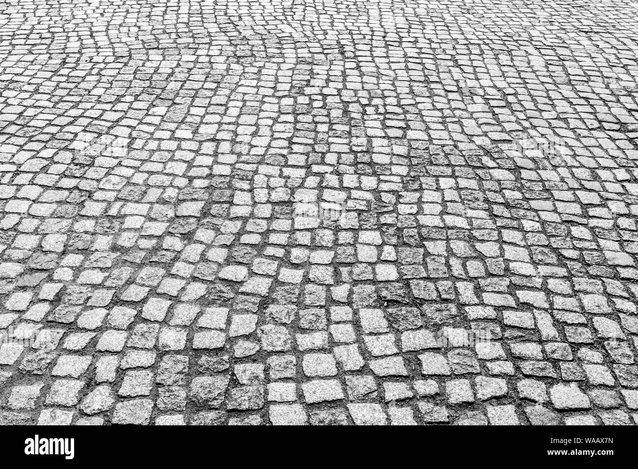 Top view on paving stone road. Old pavement of granite texture. Street ...