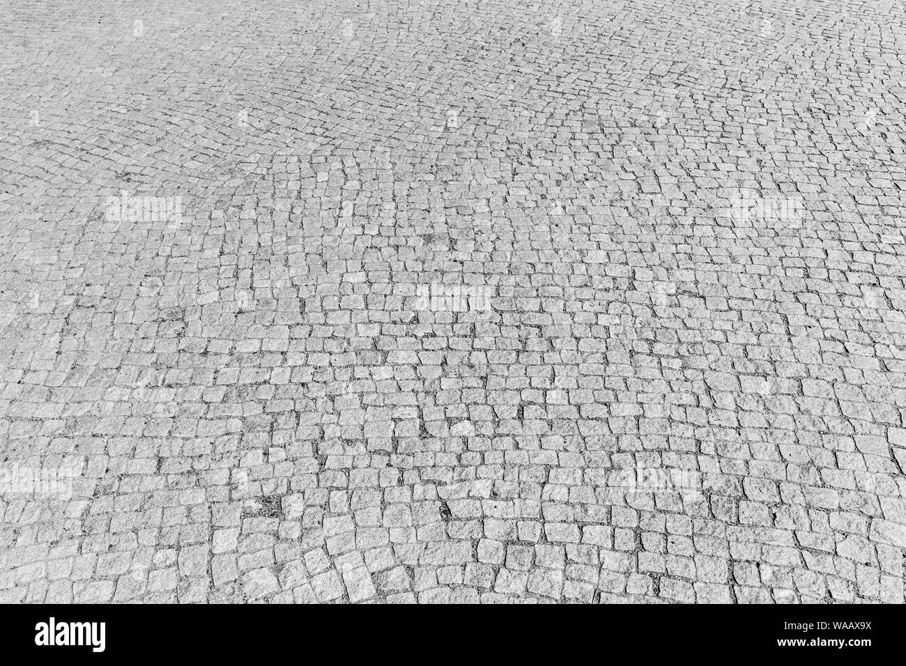 Top view on paving stone road. Old pavement of granite texture. Street ...