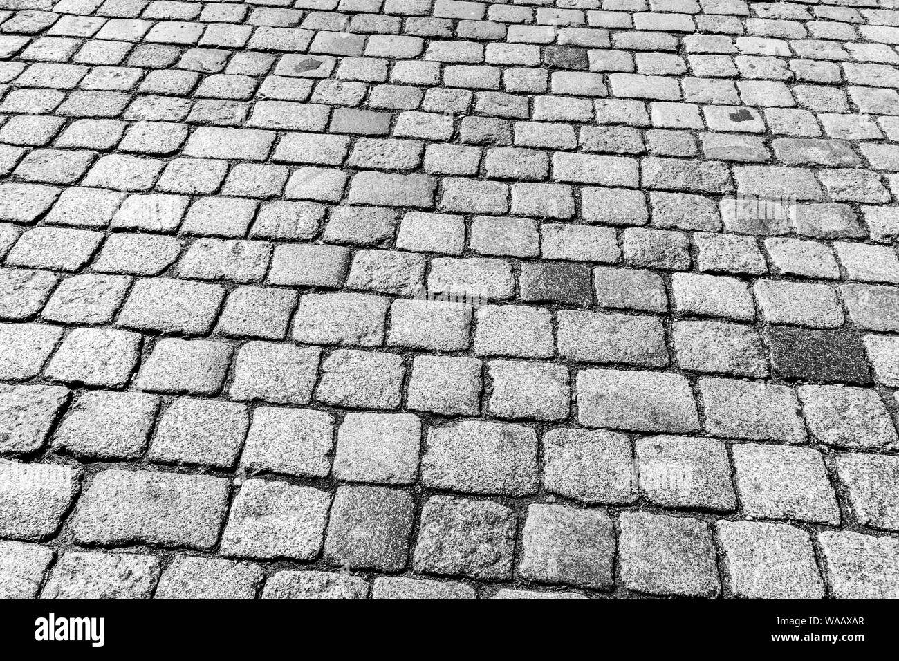 Top view on paving stone road. Old pavement of granite texture. Street ...