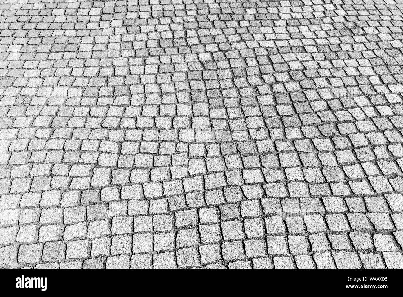 Top view on paving stone road. Old pavement of granite texture. Street ...