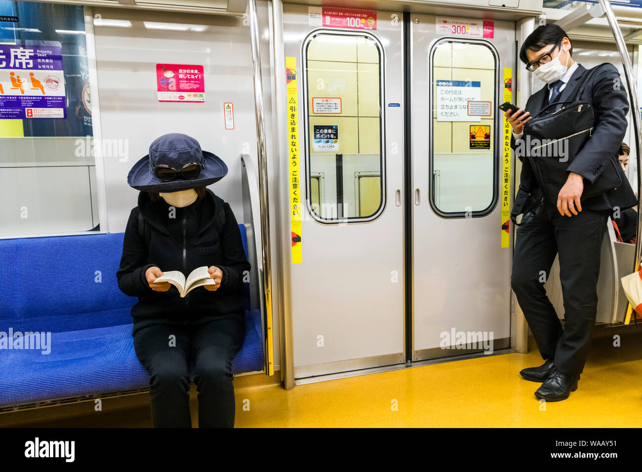Japan, Honshu, Tokyo, Subway, Subway Passengers Wearing Allergy Masks ...