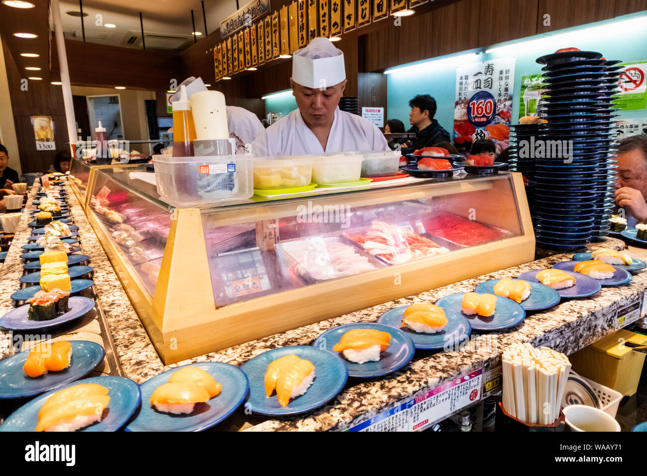 Moving sushi restaurant hi-res stock photography and images - Alamy