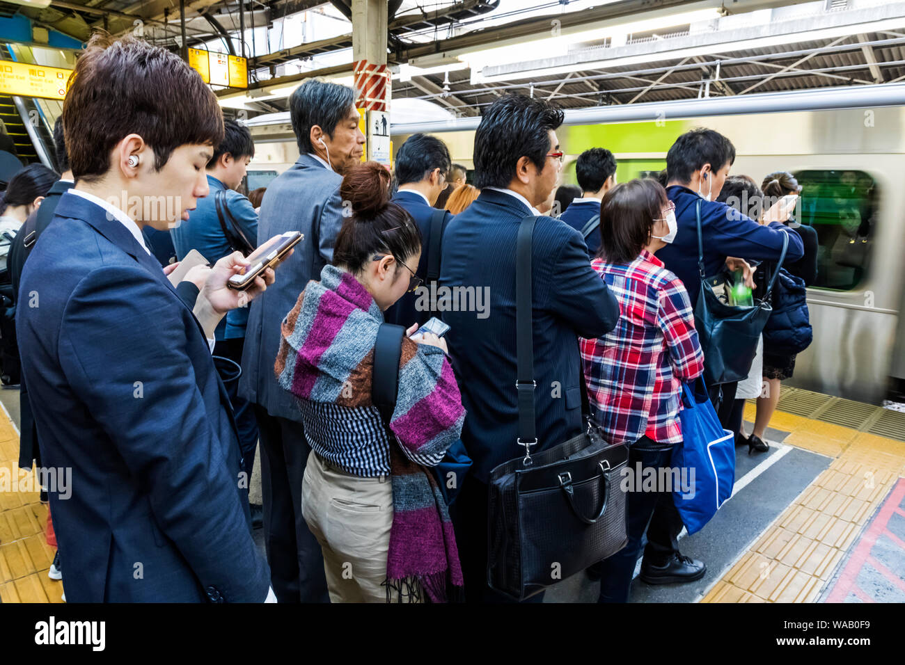 Japan, Honshu, Tokyo, Shinjuku, Shinjuku Train Station, Commuters on ...