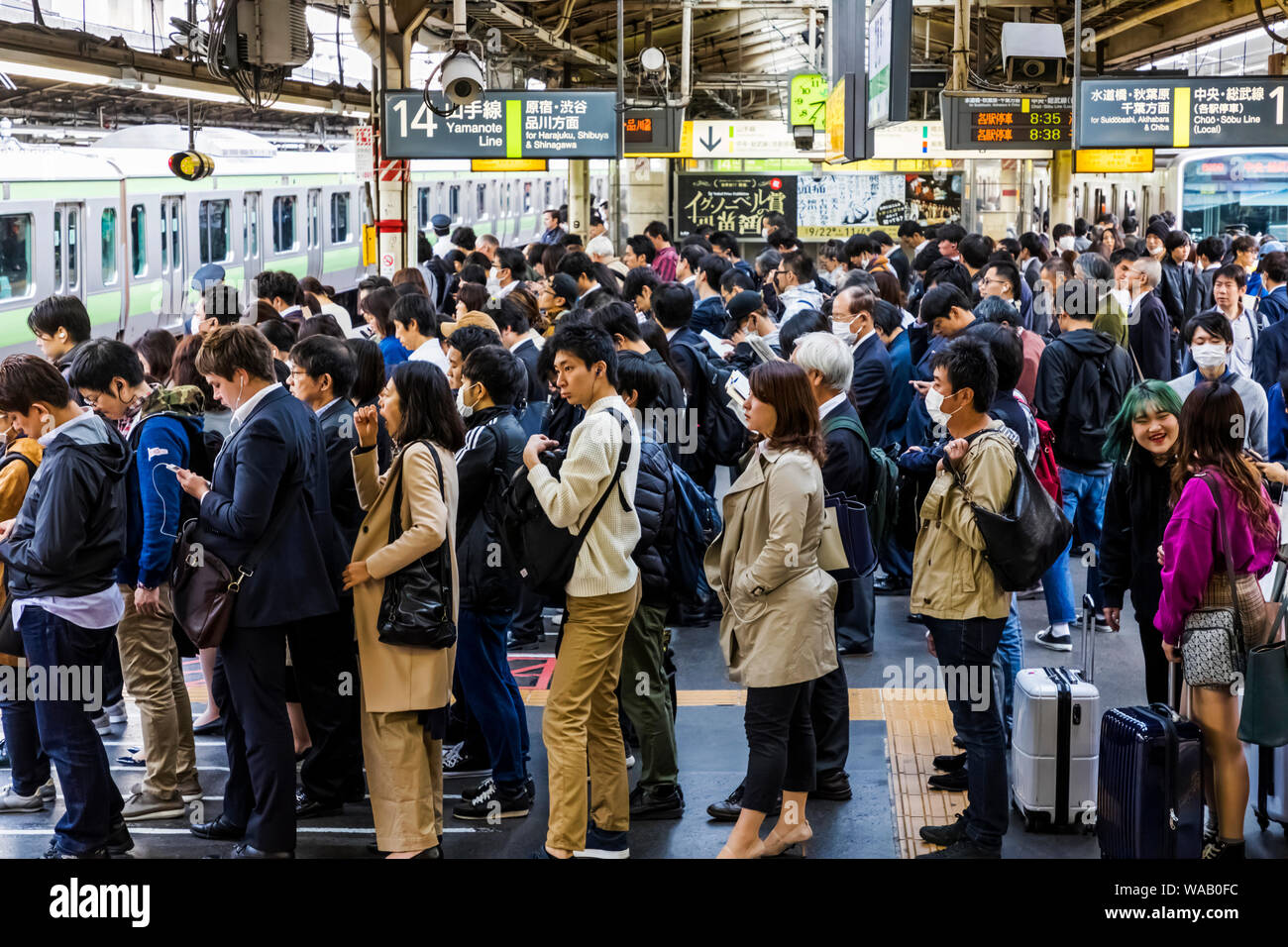 Tokyo crowds passengers hi-res stock photography and images - Alamy