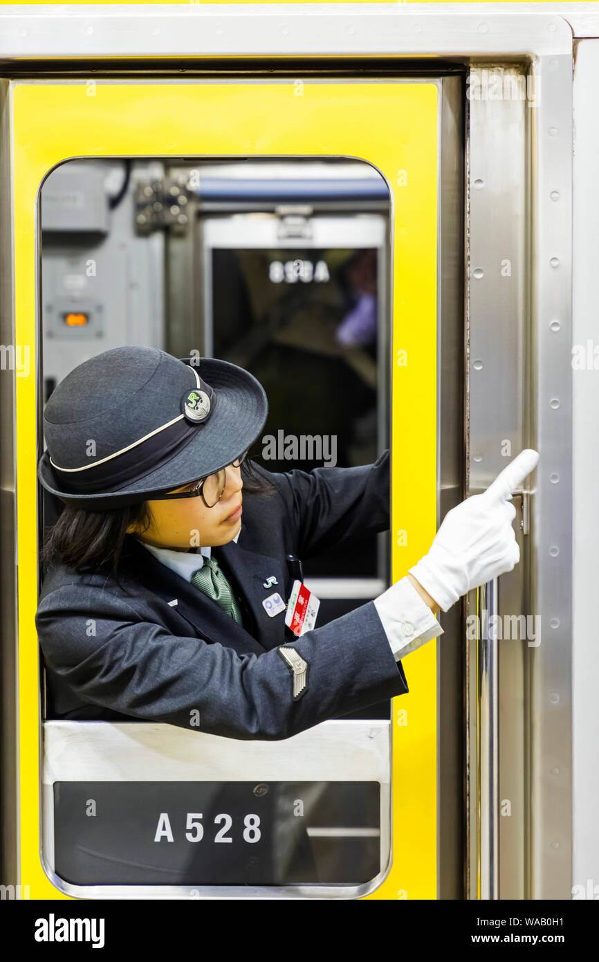 Female train conductor asia hi-res stock photography and images - Alamy