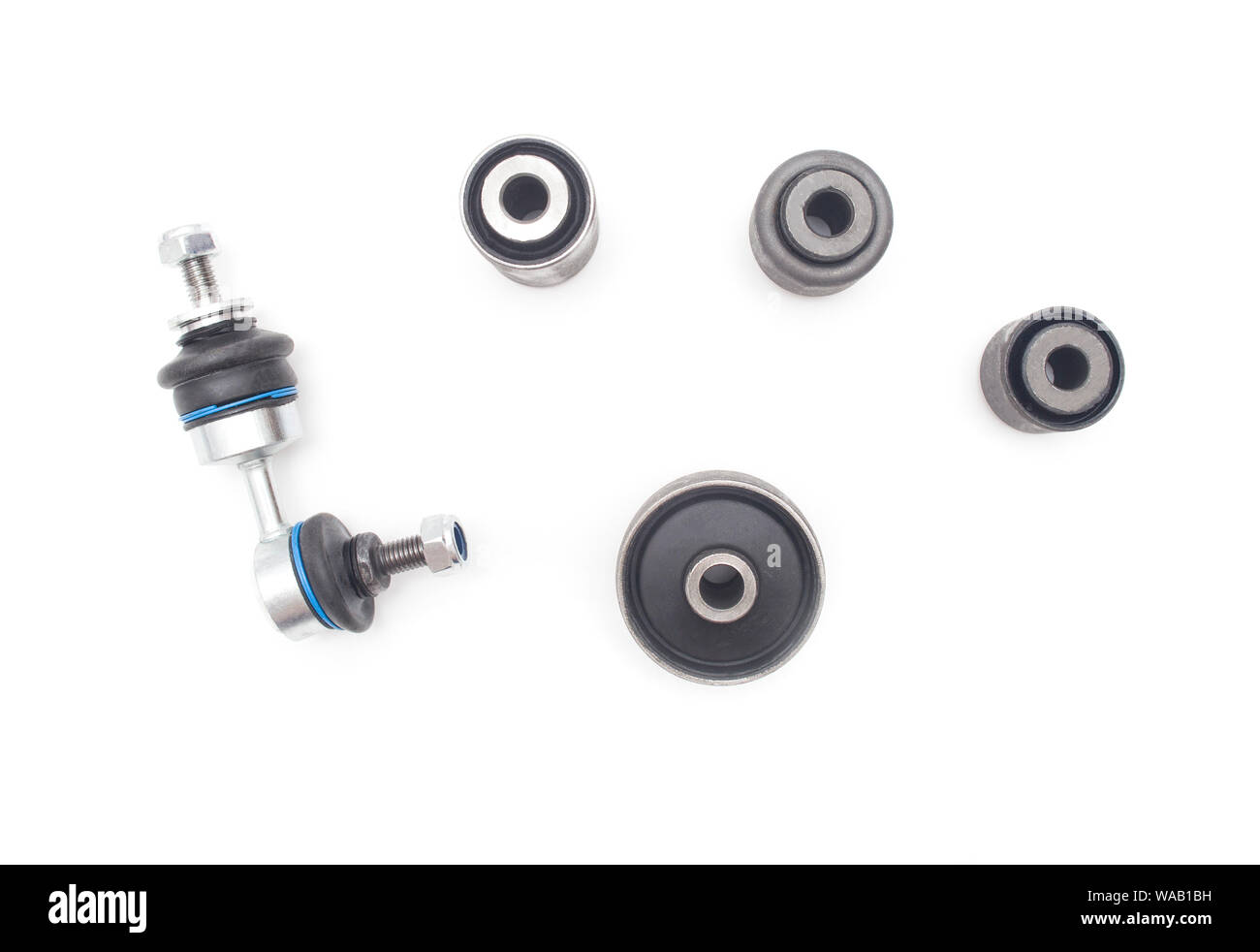 Set of silent blocks and stabilizer rod for car suspension on a white ...