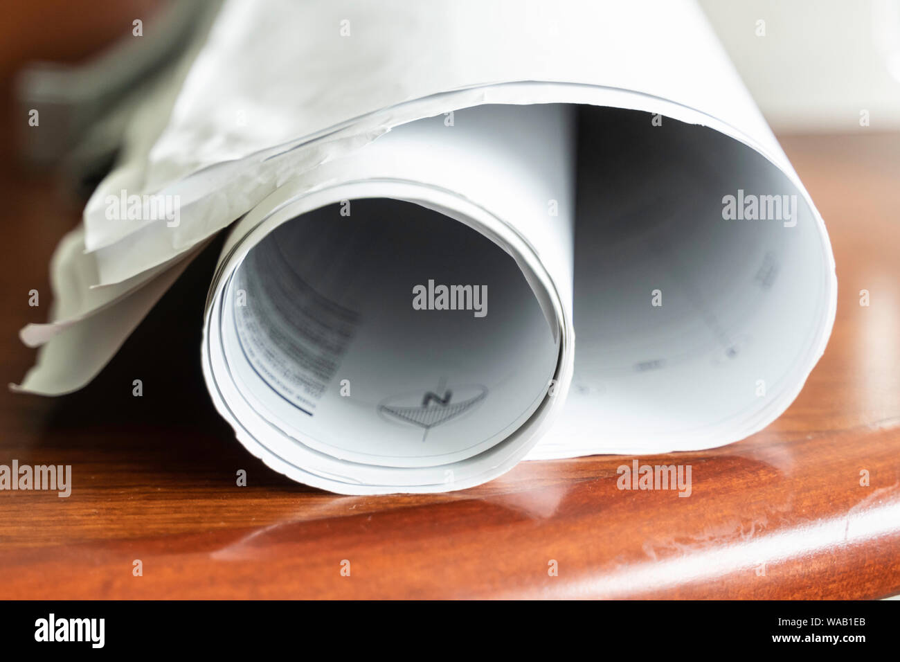 Rolled Blueprint plans for new residential developments Stock Photo - Alamy