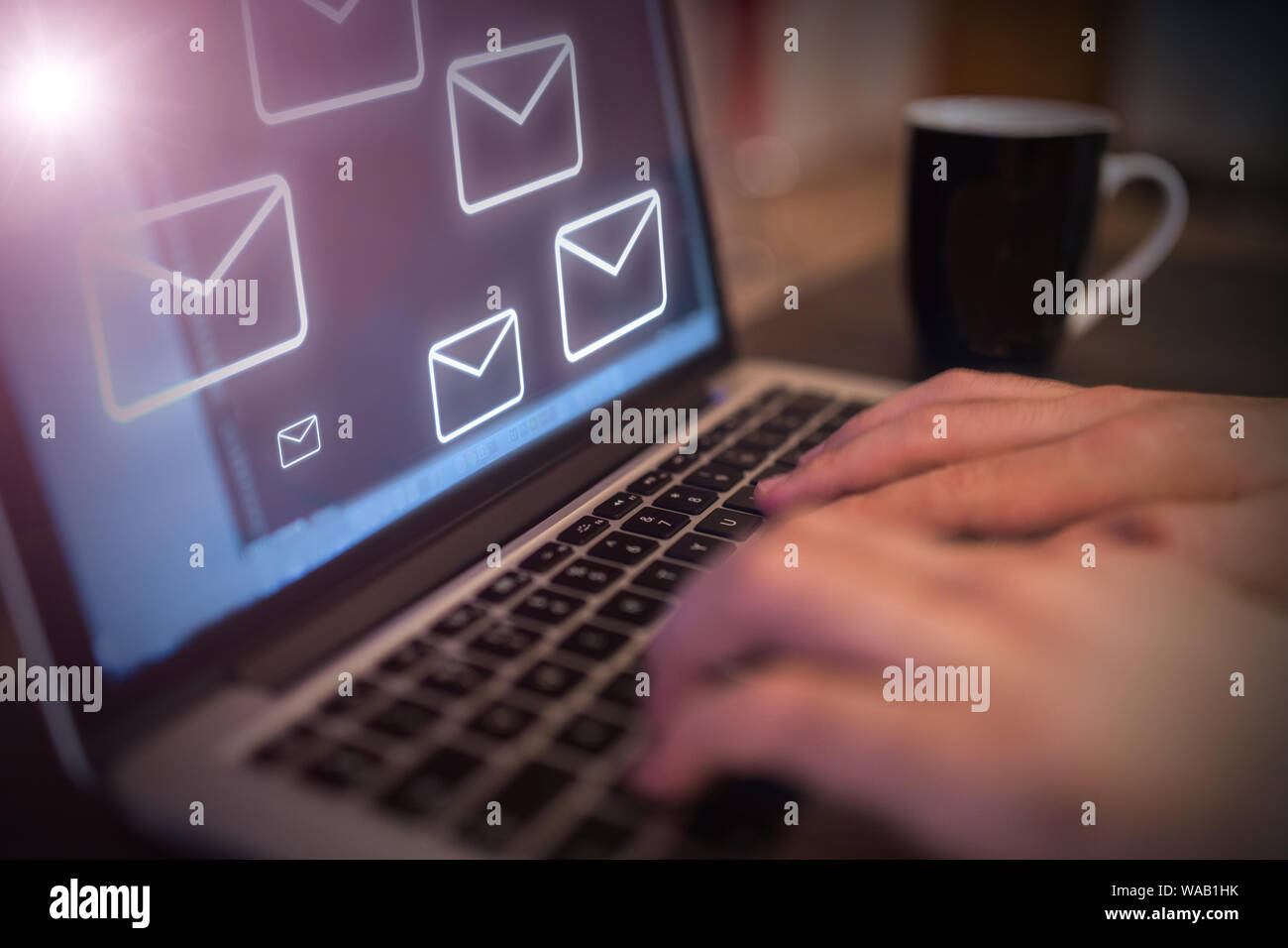 e-mail icons that come from a personal computer screen Stock Photo - Alamy