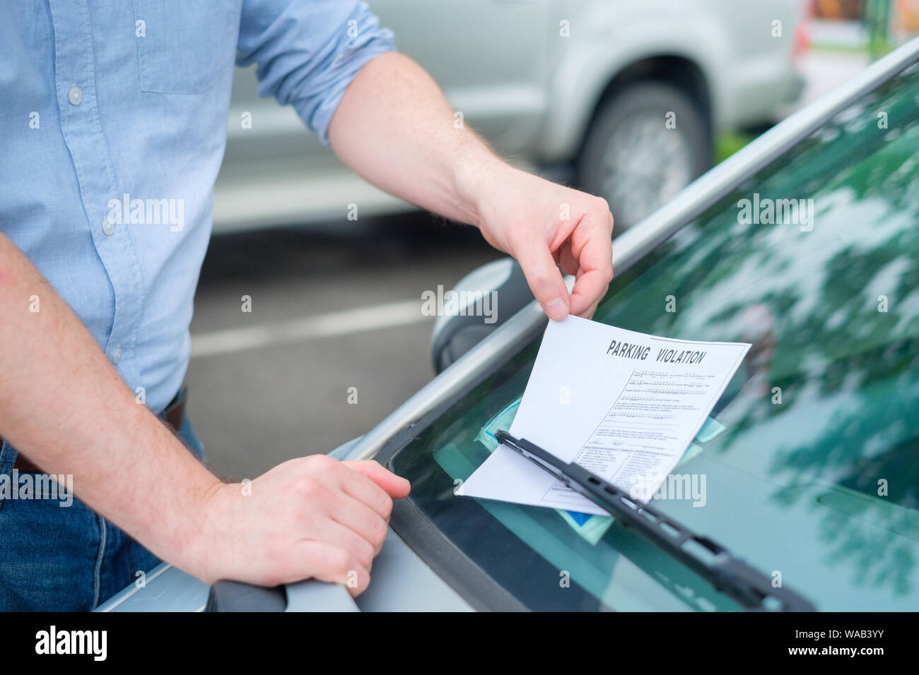 Hand holding ticket hi-res stock photography and images - Alamy