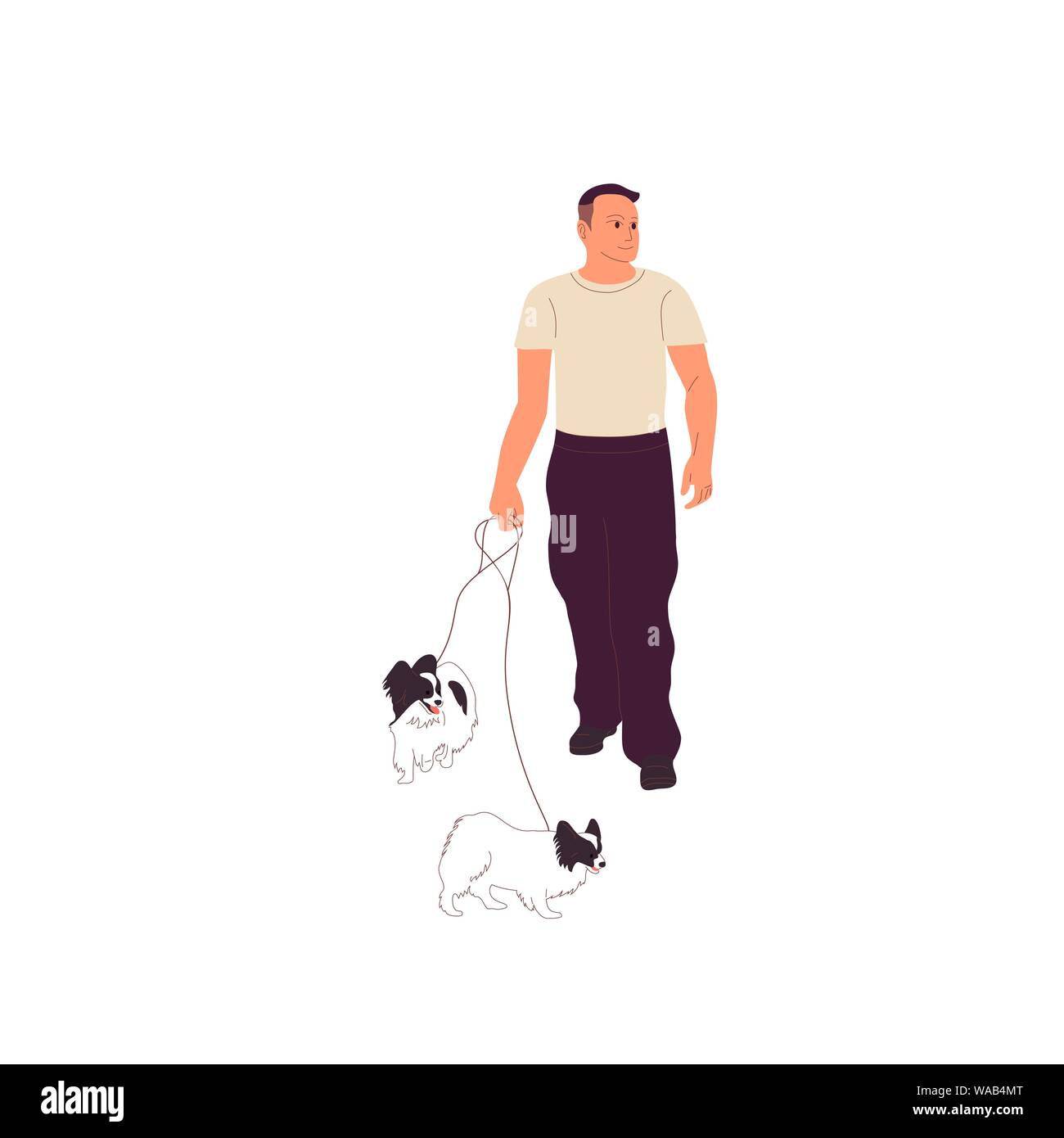 Young man in casual outfit is walking with two small papillon dogs on a ...