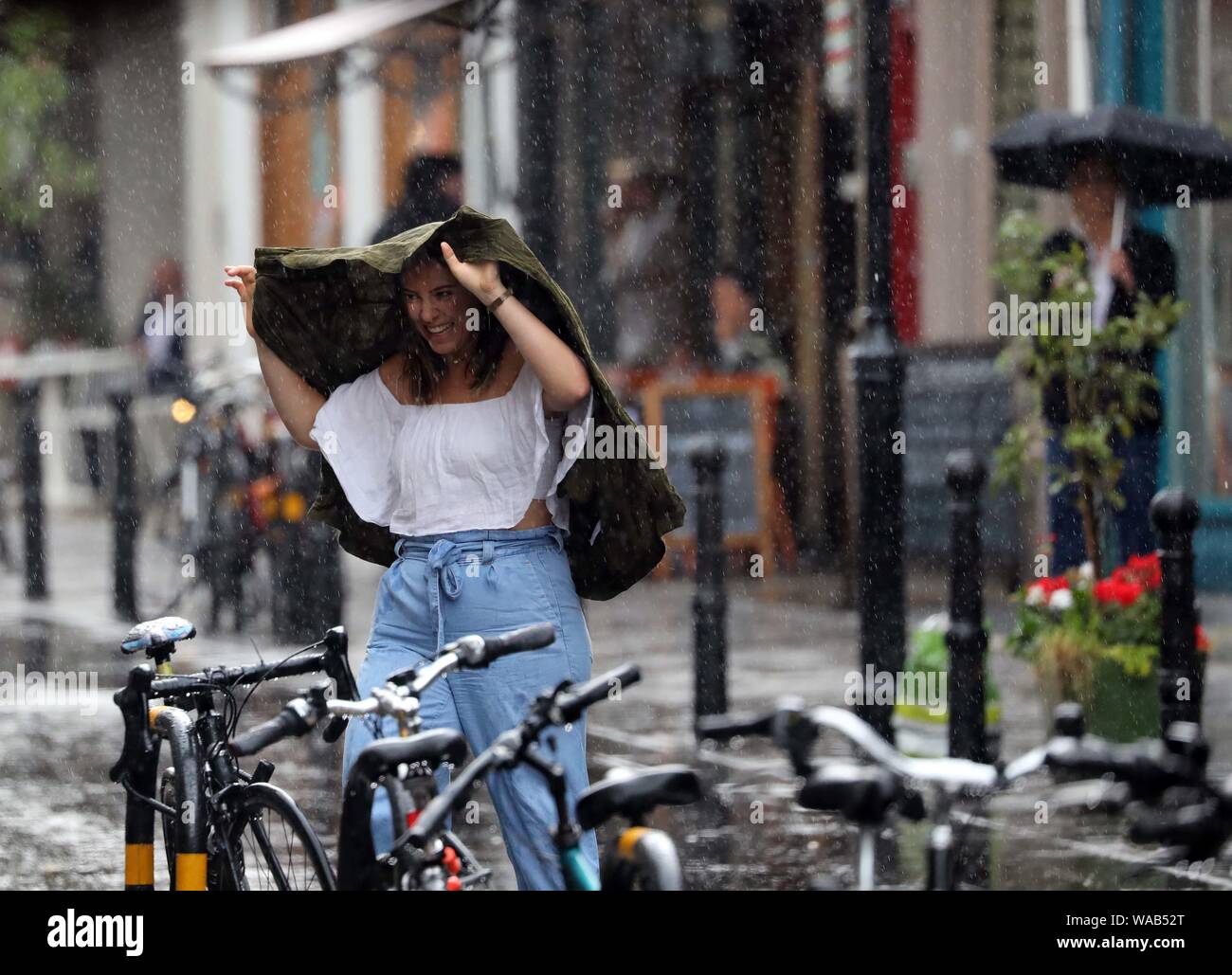 Rain soaked clothes hi-res stock photography and images - Alamy