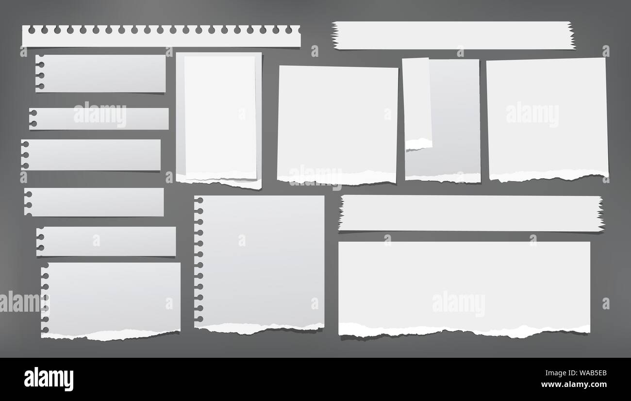 Set of torn white note, notebook strips, paper pieces stuck on dark ...
