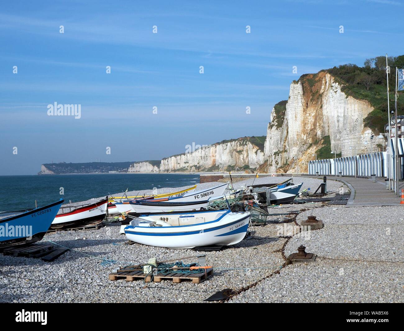 Yport, France, 15.05.2019: Boats on the beach. In the background the ...