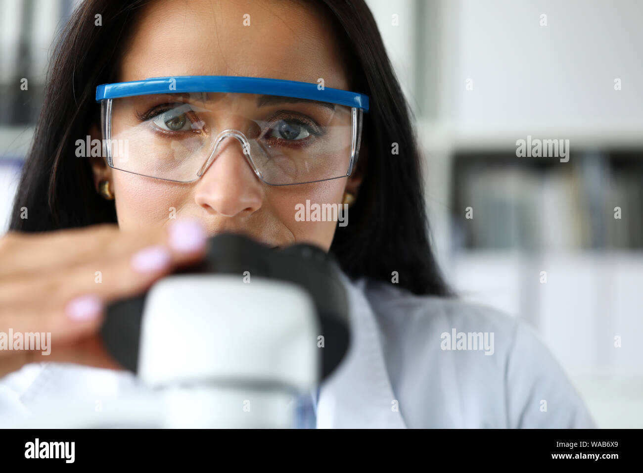 Beautiful female scientist using hi-res stock photography and images ...