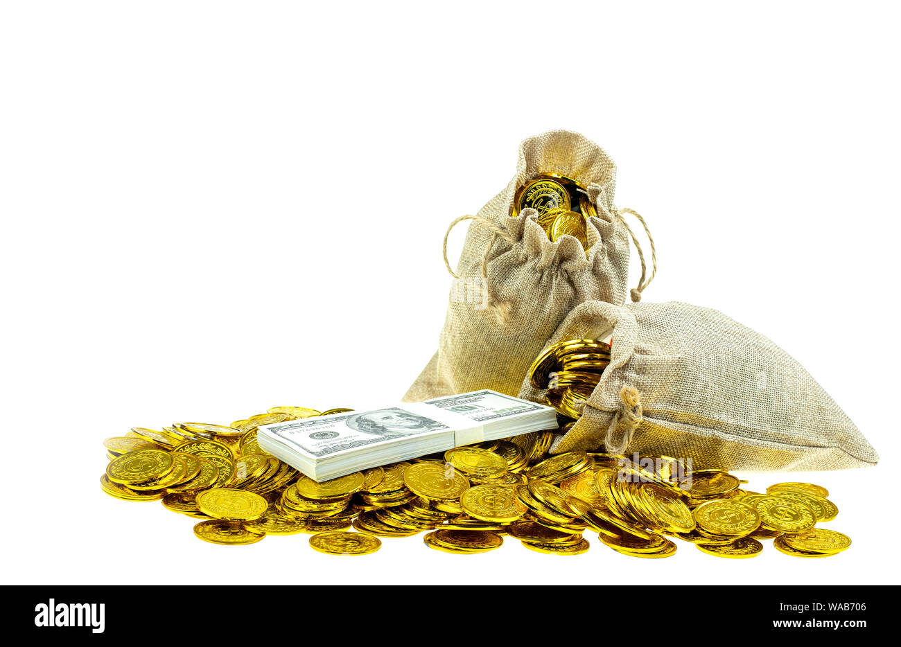 Stacking gold coin in treasure sack on white background Stock Photo - Alamy