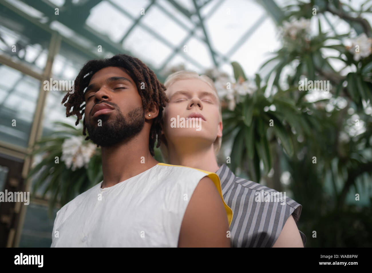 Two men of different skin color participating in social campaign Stock ...