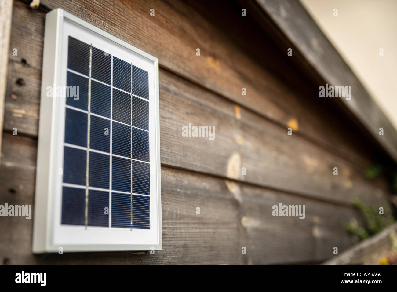 Small solar panel on a garden shed Stock Photo - Alamy