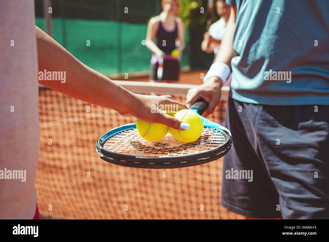 Close-up of a couple tennis player before serving to tennis match on ...