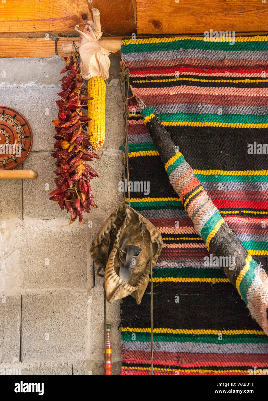 Traditional old bulgarian objects - dried pepper, corn, clay pots ...