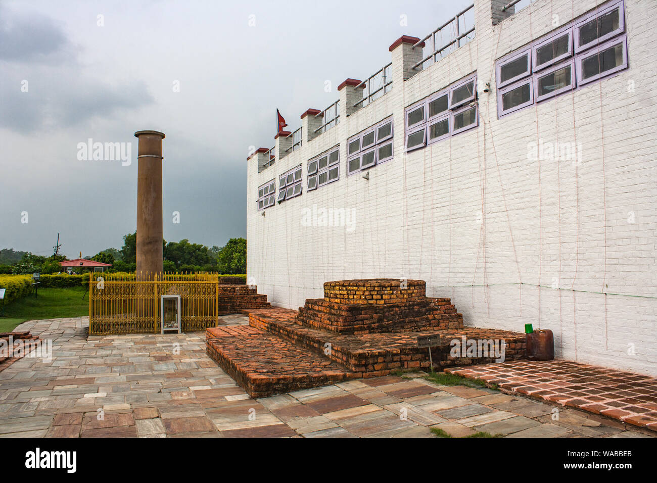 Ashoka Pillar with Mayadevi Temple Stock Photo - Alamy