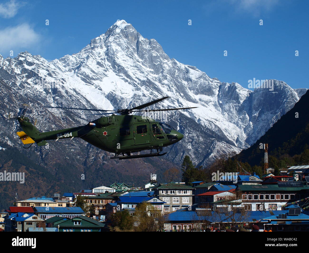 Military helicopter landing in Lukla, Nepal Stock Photo - Alamy