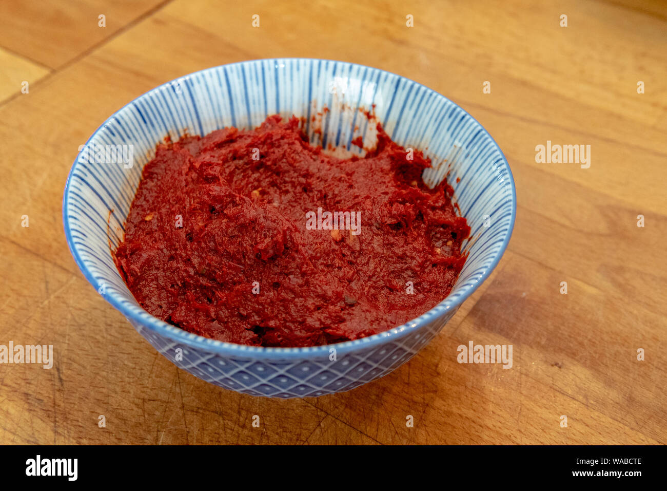 homemade Turkish tomato paste - ezme in blue and white bowl Stock Photo ...